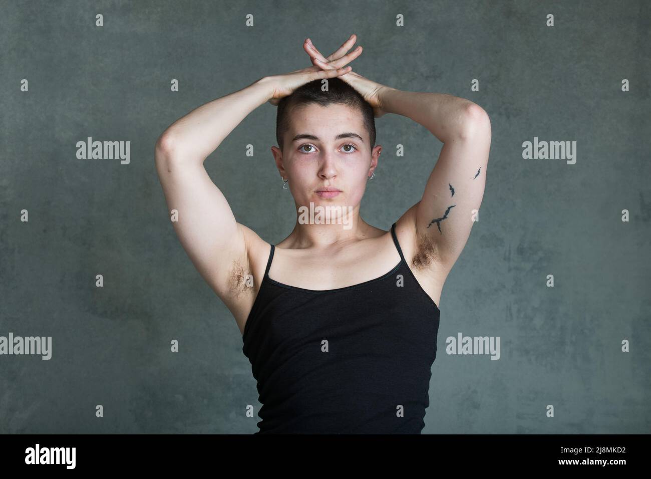 non binary pulling an angry, frustrated face Stock Photo - Alamy