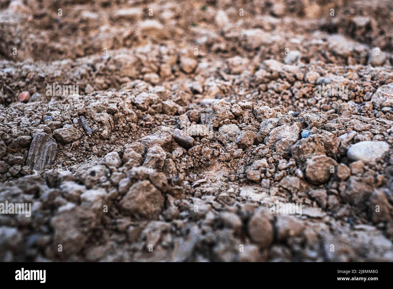 Brown plowed soil texture background.Close up view Stock Photo - Alamy