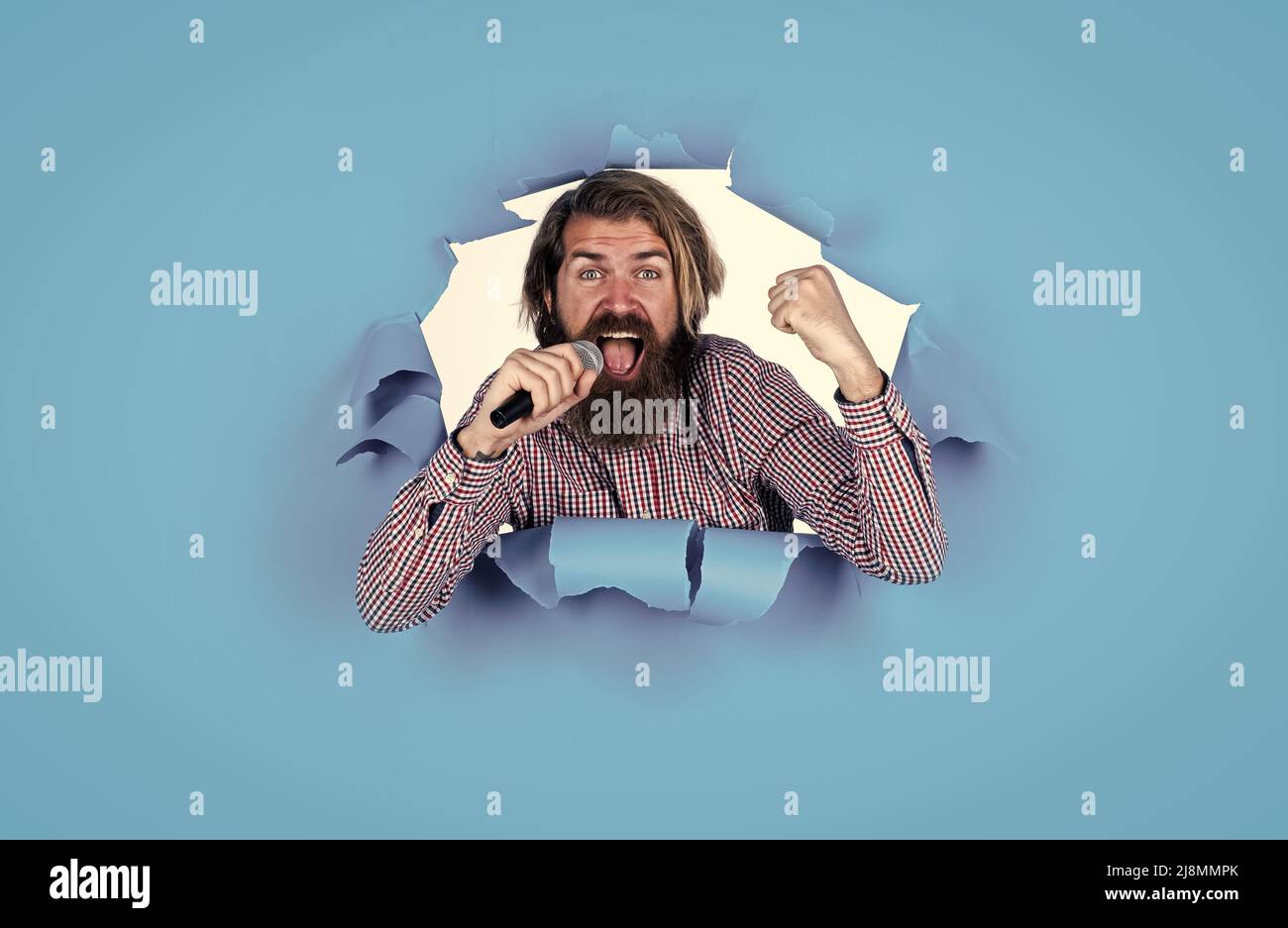 announce the winner. brutal male hipster with microphone. vocal school ...