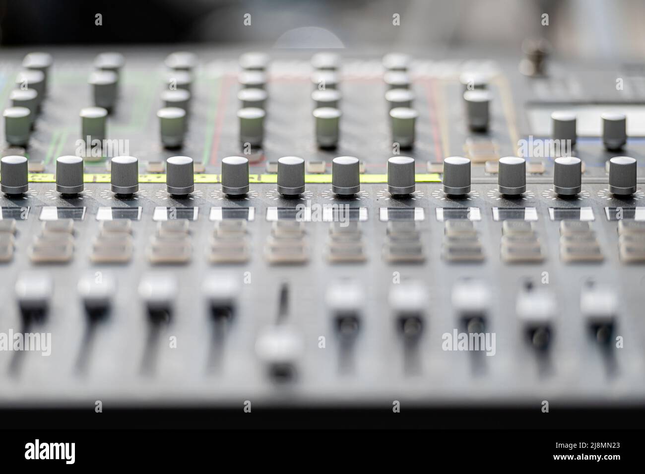 Sound and audio mixer control panel with buttons and sliders. Audio ...