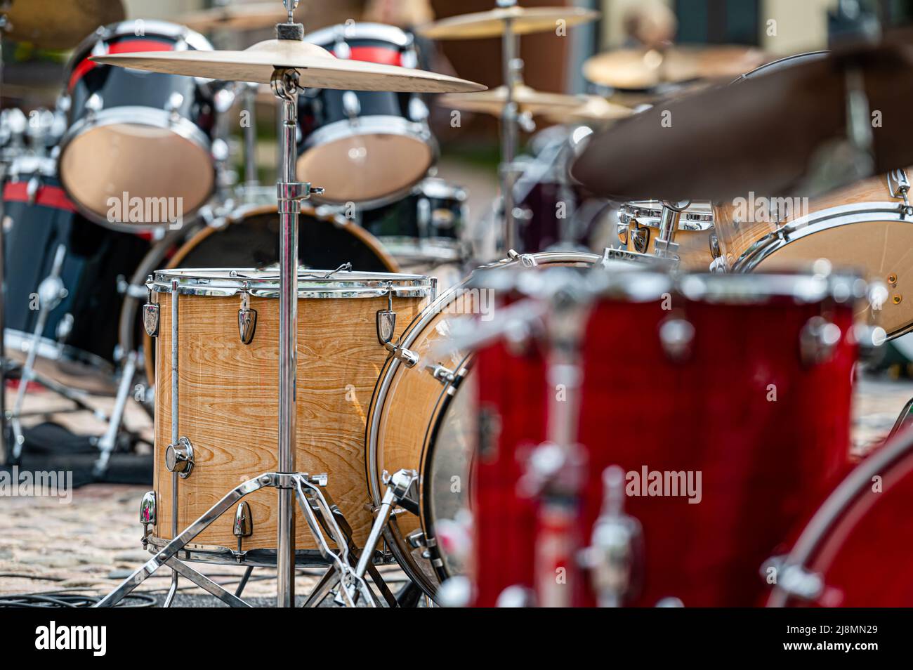 A set of plates in a drum set. At a concert of percussion music ...