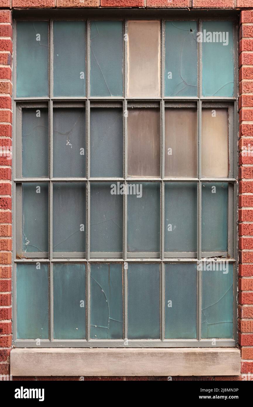 Vintage windows on the wall of an old abandoned factory Stock Photo - Alamy