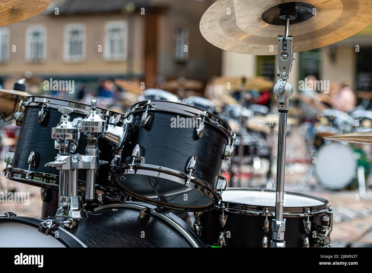A set of plates in a drum set. At a concert of percussion music ...