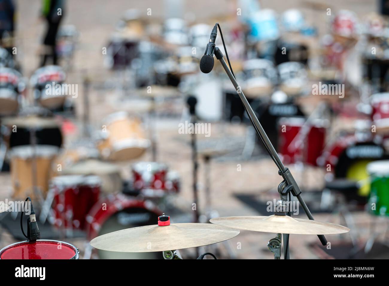 A set of plates in a drum set. At a concert of percussion music ...