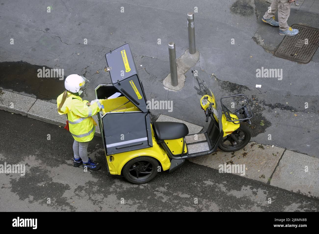 Milan (Italy), mail delivery Stock Photo - Alamy