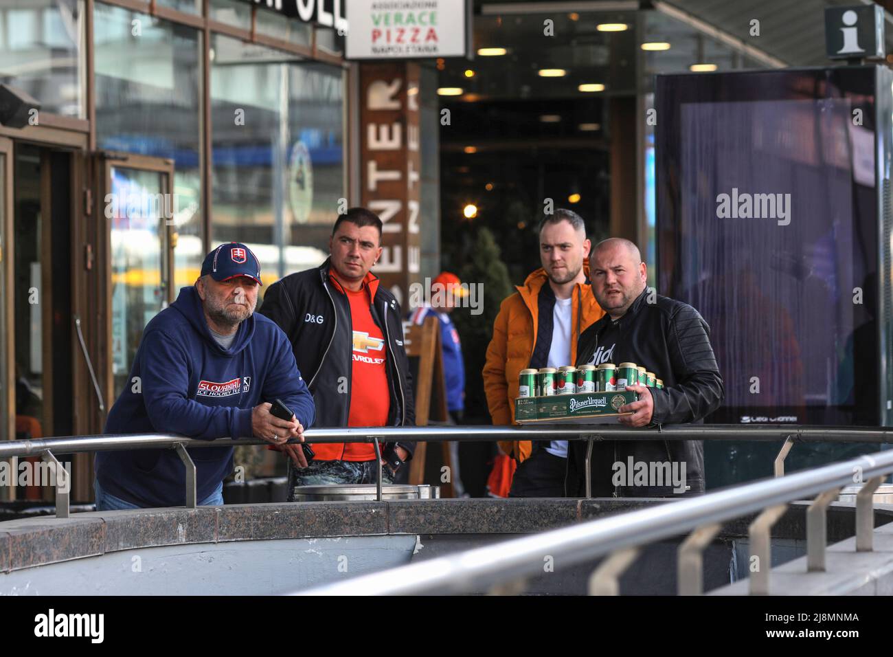 Ice hockey fans standing in front of Central Railway Station. Many ...