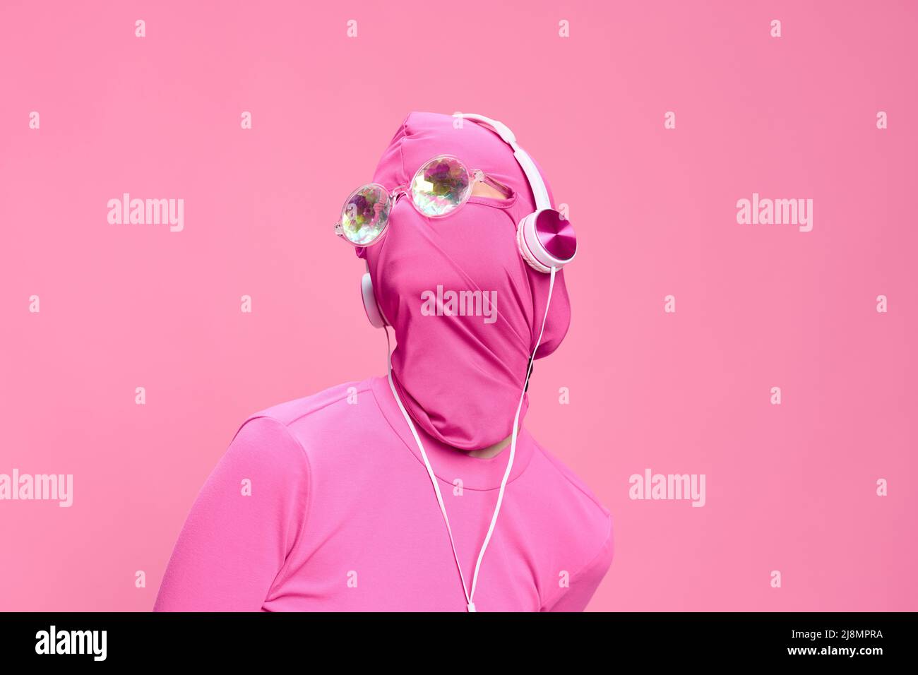Creative crazy pink photo on a pink background with pink clothes and ...