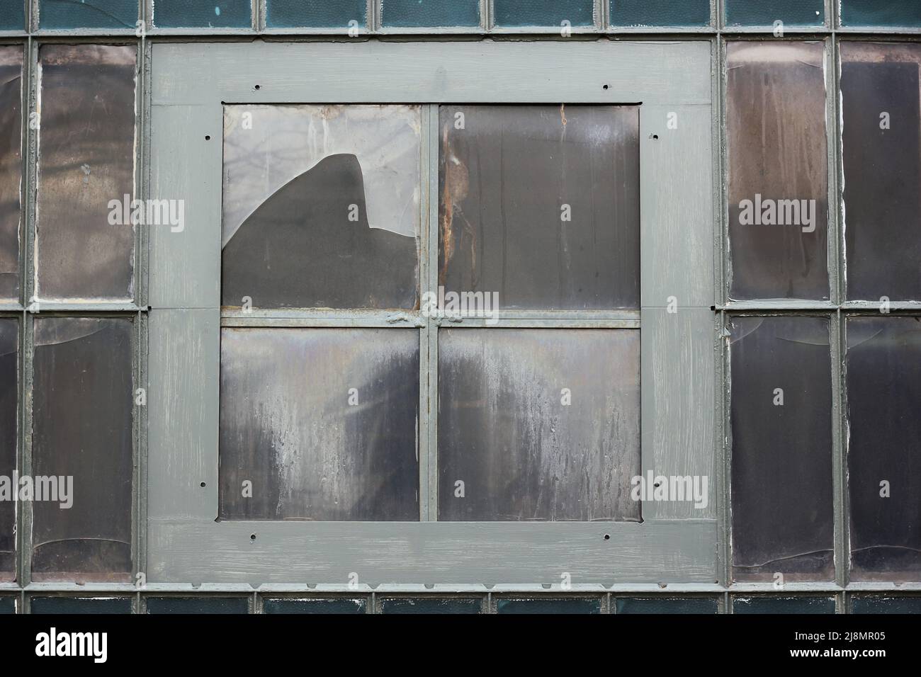 Vintage windows on the wall of an old abandoned factory Stock Photo - Alamy