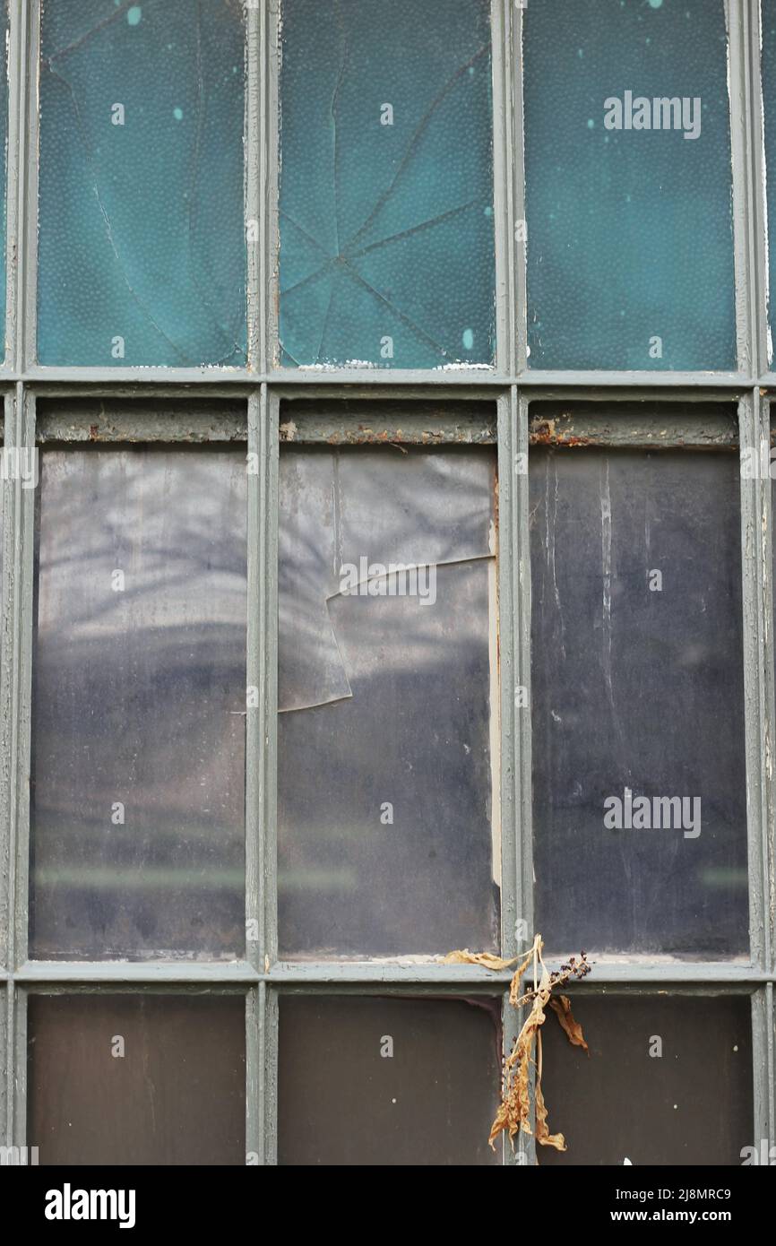 Vintage windows on the wall of an old abandoned factory Stock Photo - Alamy