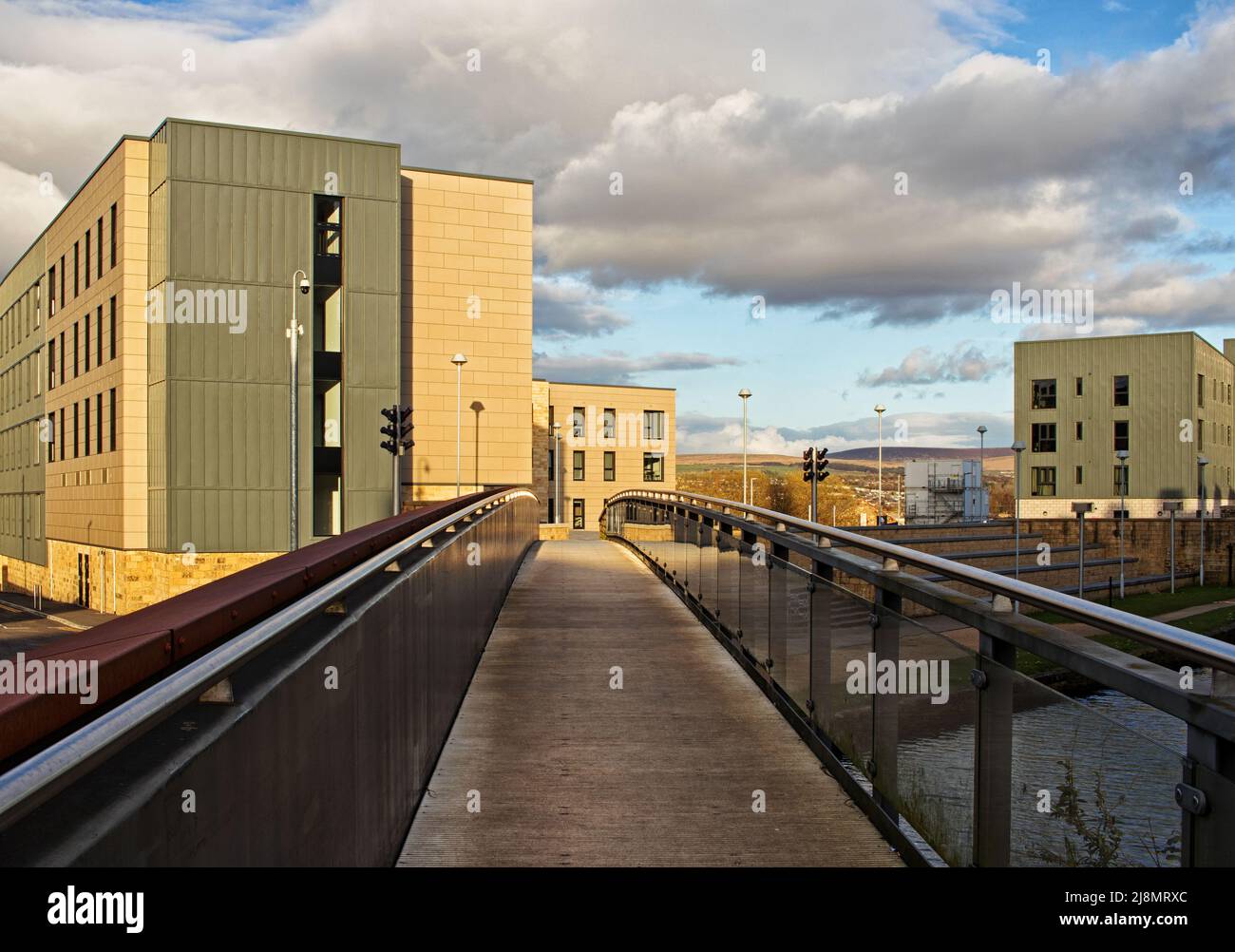 Looking along a footbridge spanning the Leeds and Liverpool Canal ...