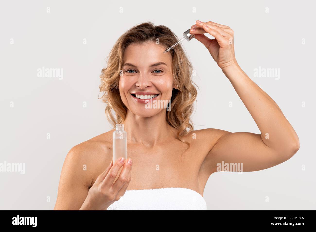 Woman moisturizing oil hi-res stock photography and images - Alamy