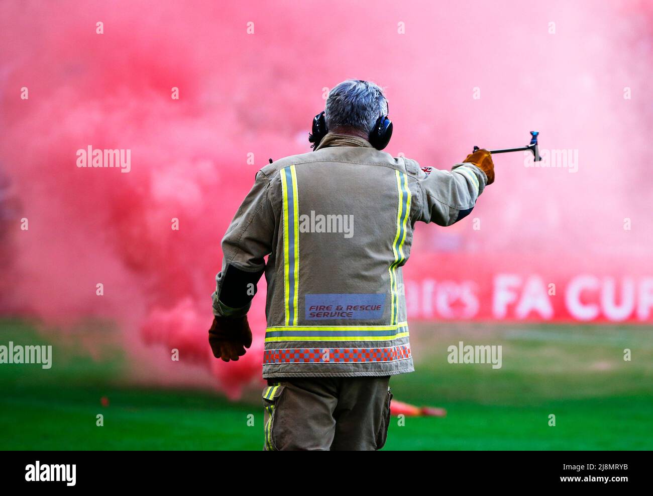 LONDON, ENGLAND - MAY 14:Fireman going clear Flares after FA Cup Final ...