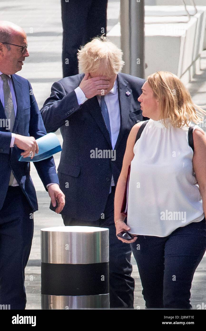 London - 17/05/2022. Prime Minister Boris Johnson is seen with his hand ...