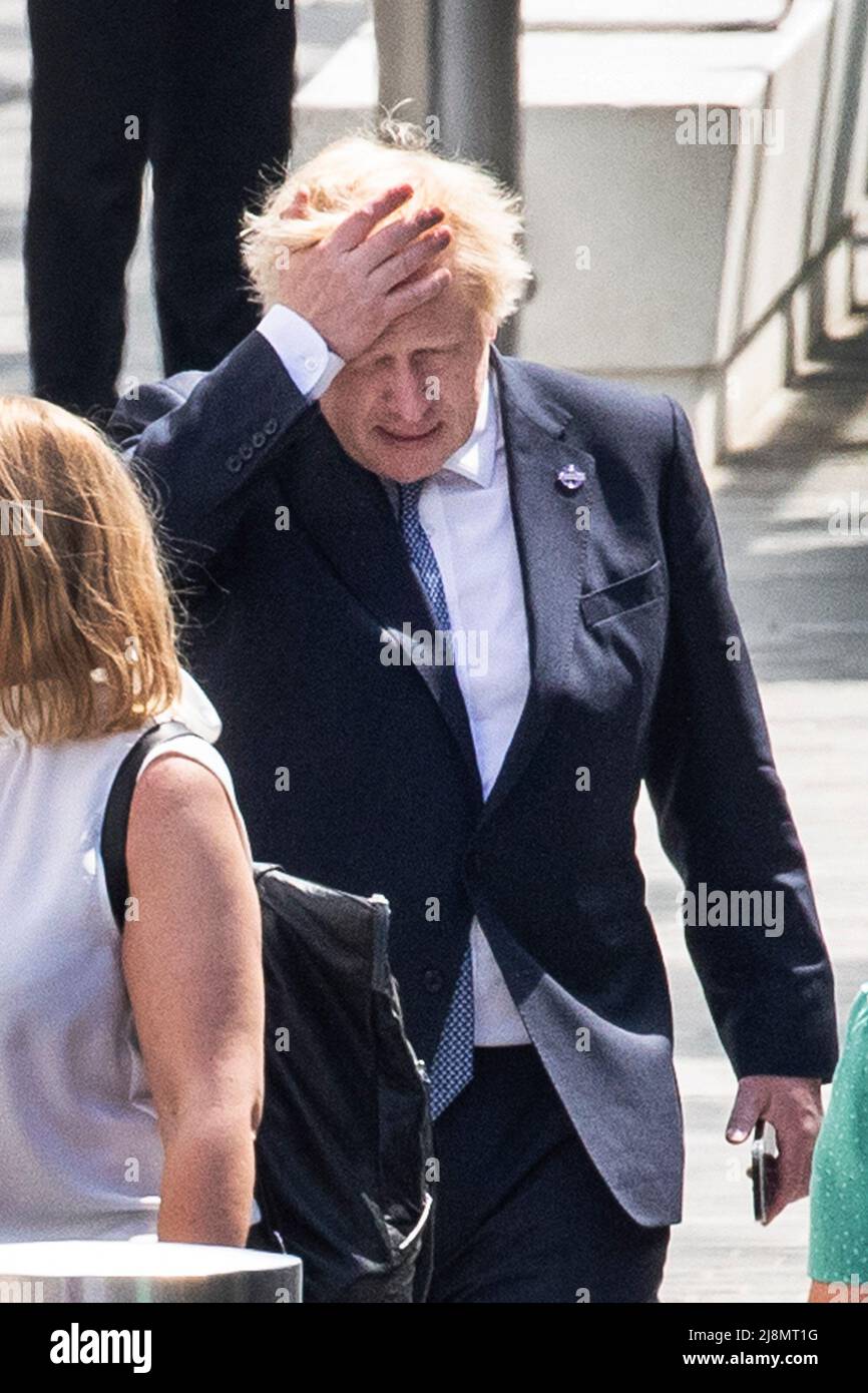 London - 17/05/2022. Prime Minister Boris Johnson is seen with his hand ...