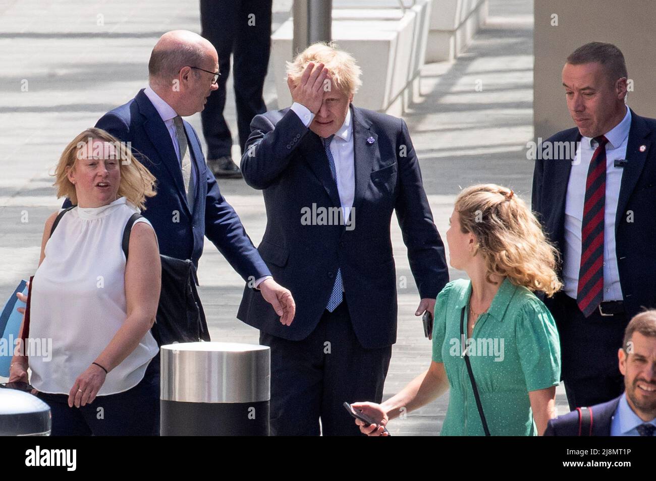 London - 17/05/2022. Prime Minister Boris Johnson is seen with his hand ...