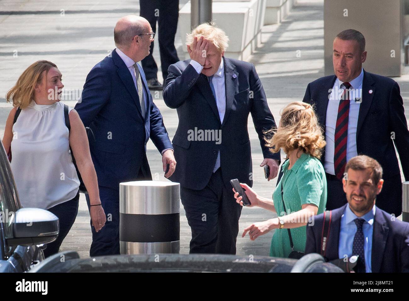 London - 17/05/2022. Prime Minister Boris Johnson is seen with his hand ...