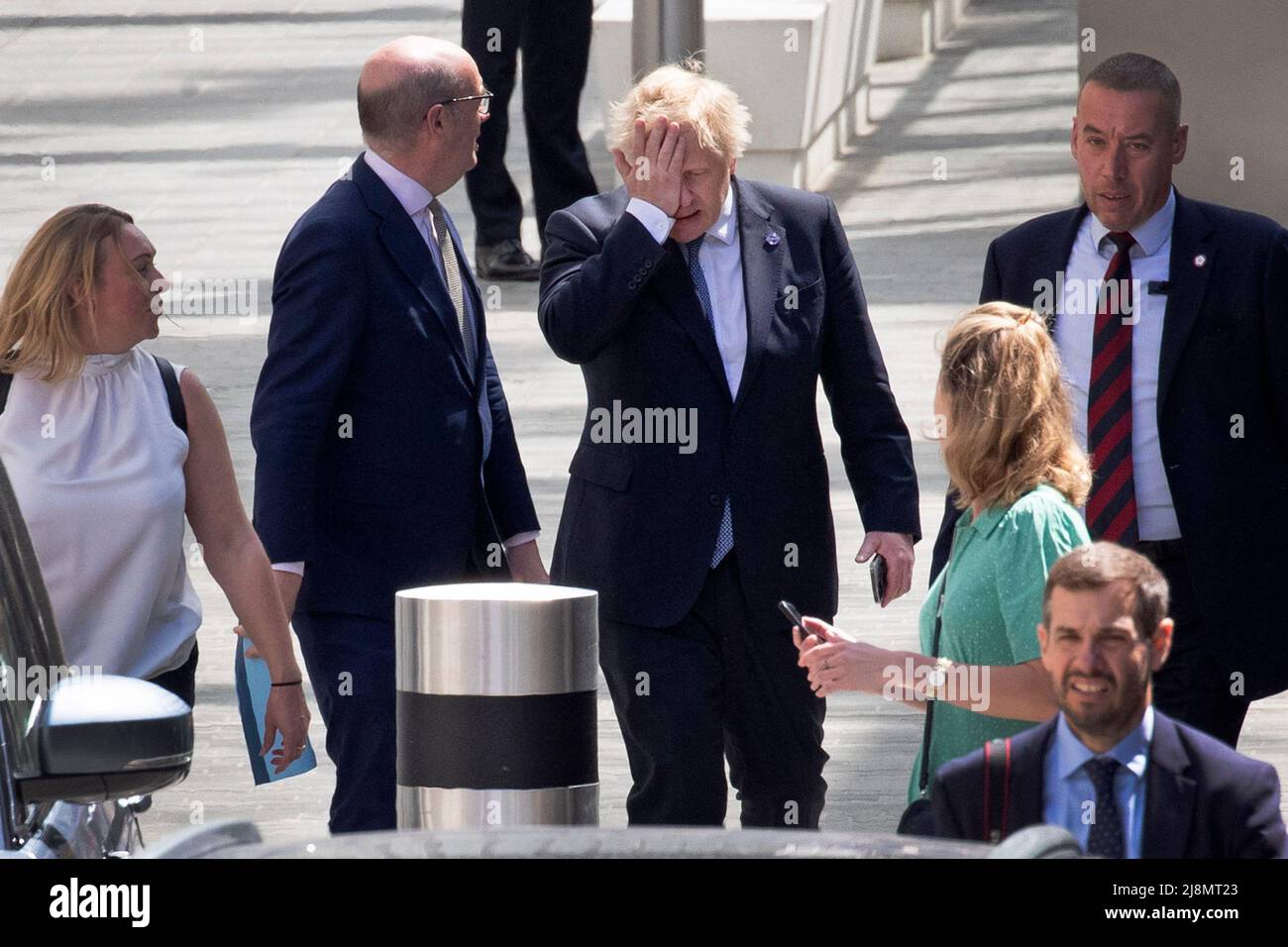 London - 17/05/2022. Prime Minister Boris Johnson is seen with his hand ...