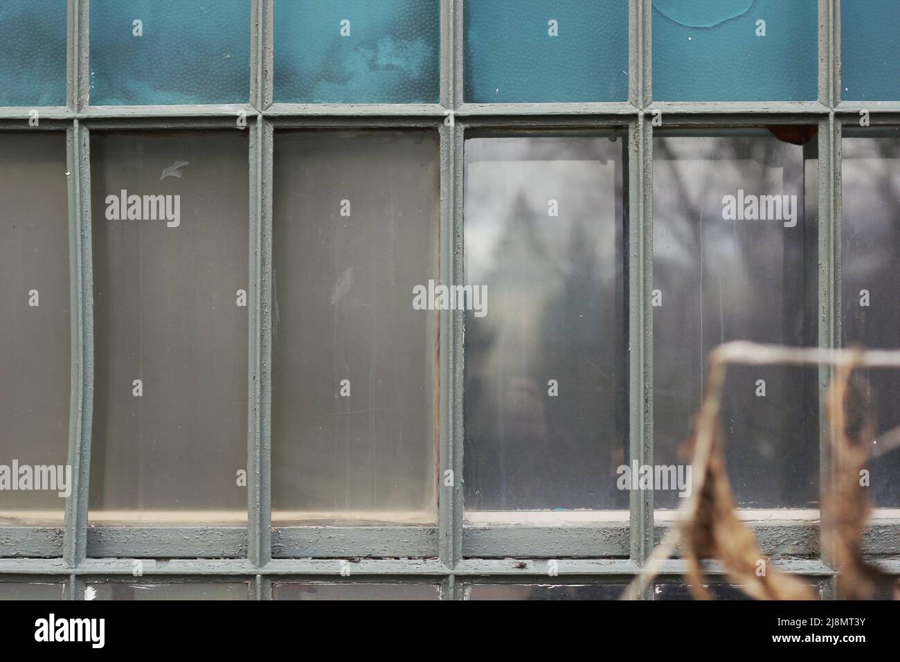 Vintage windows on the wall of an old abandoned factory Stock Photo - Alamy