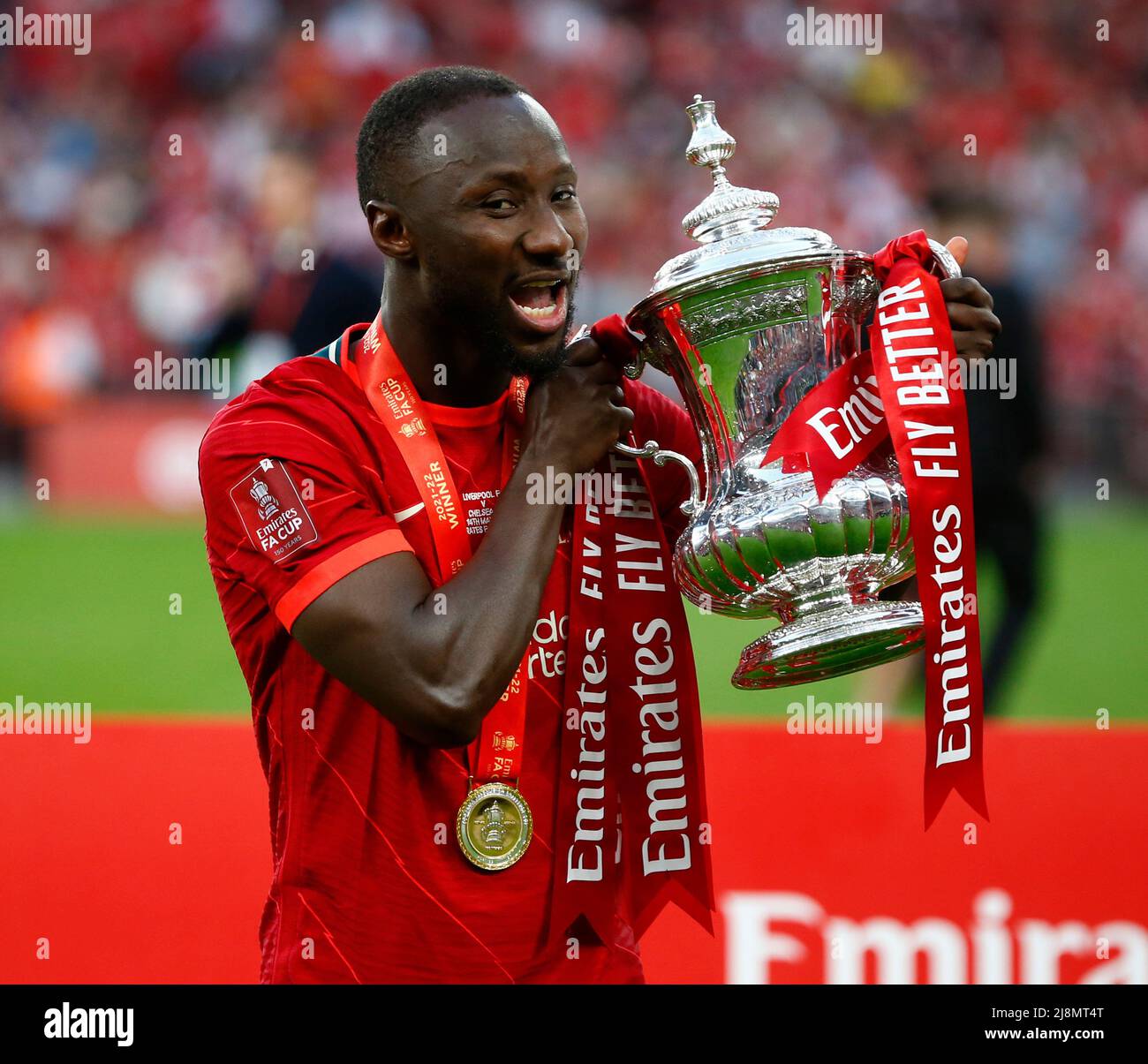 LONDON, ENGLAND - MAY 14:Liverpool's Sadio Mane holds the FA Cup after ...