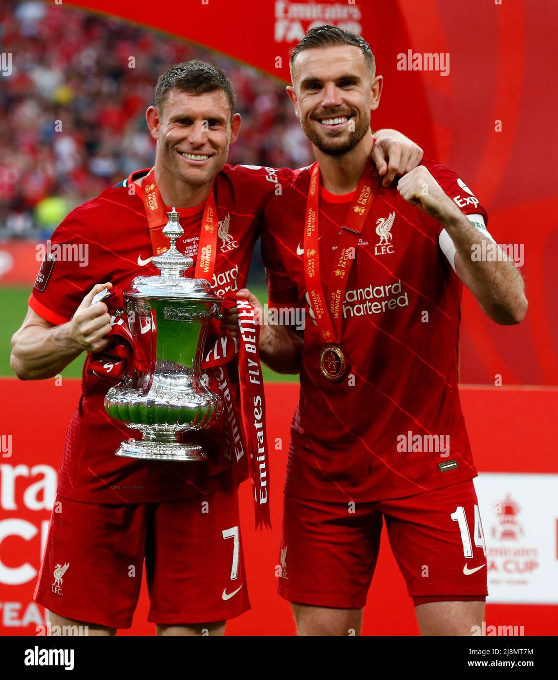 LONDON, ENGLAND - MAY 14: Liverpool's James Milner holds the FA Cup ...
