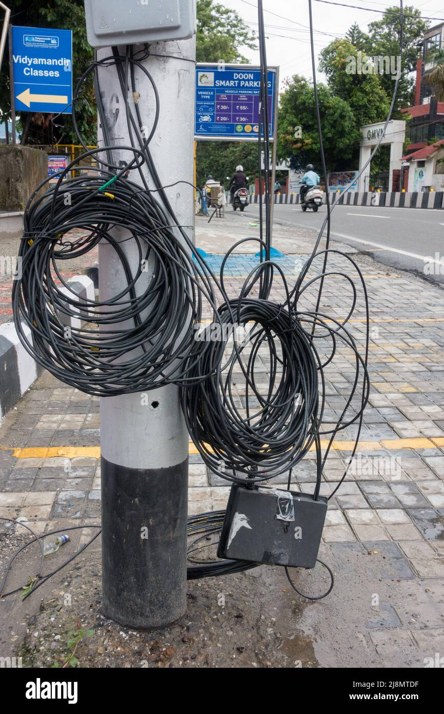 5th July 2020. Uttarakhand, India. Electricity poles with overcrowded ...