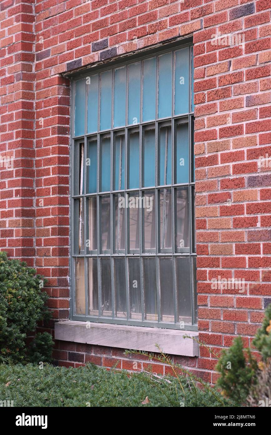 Vintage windows on the wall of an old abandoned factory Stock Photo - Alamy