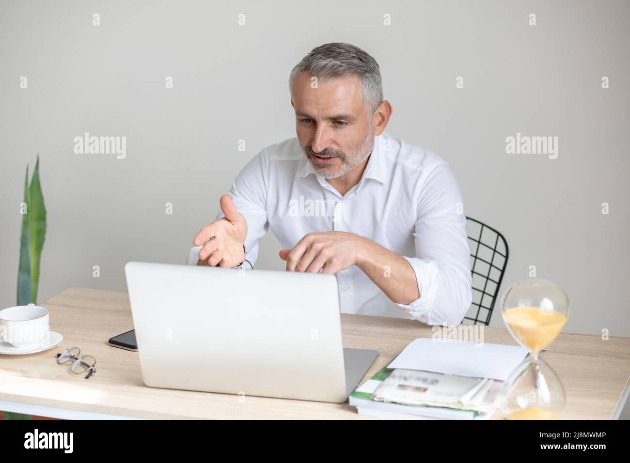 Video call attentive man hi-res stock photography and images - Alamy