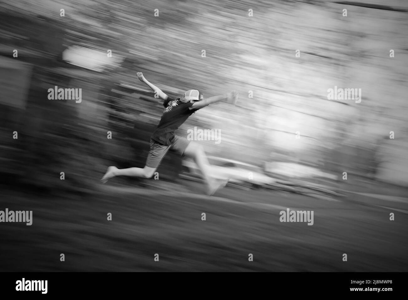 Boy running Black and White Stock Photos & Images - Alamy