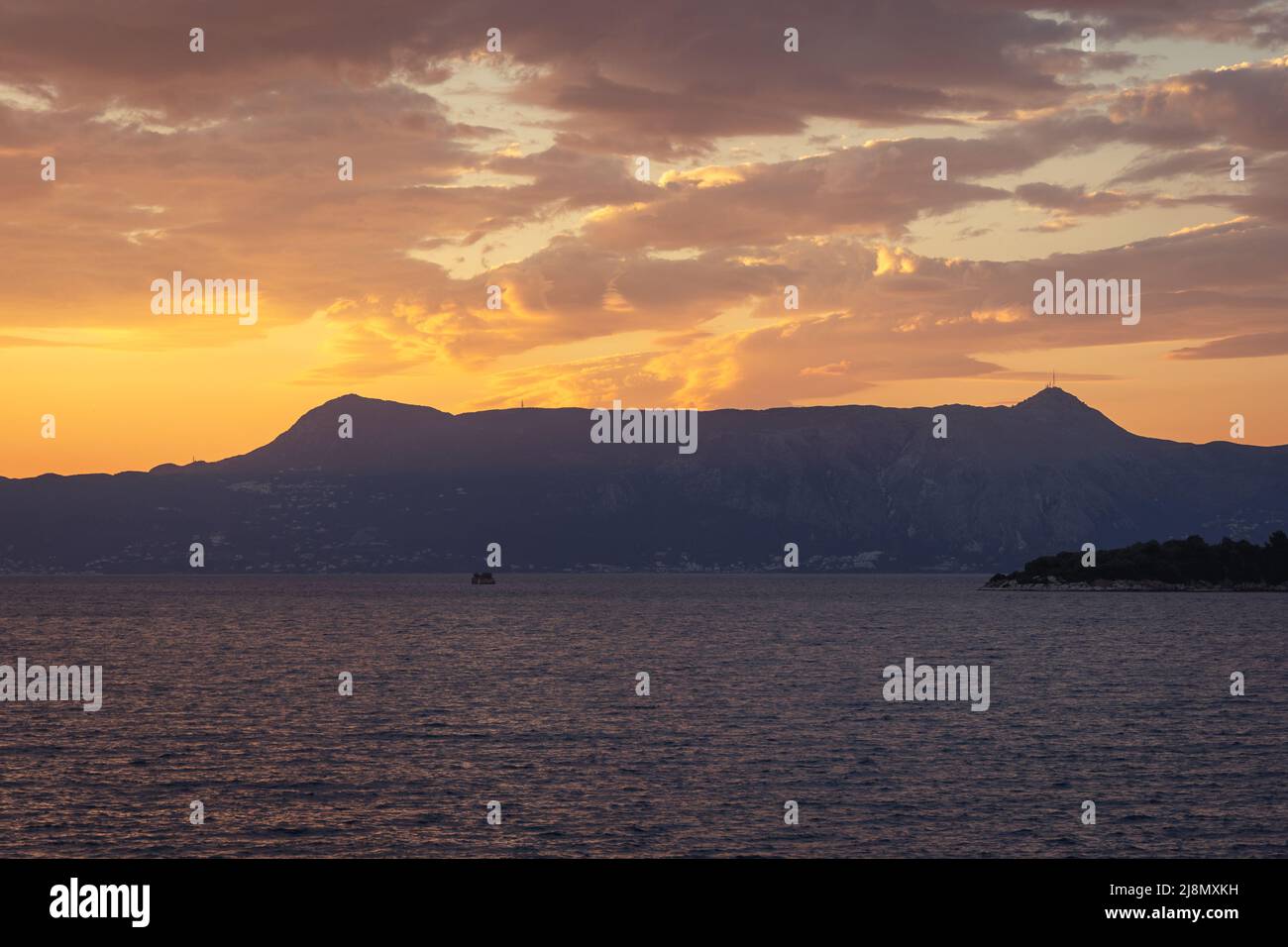 Sunset seen from Old Town of Corfu city on the island of Corfu, Ionian ...