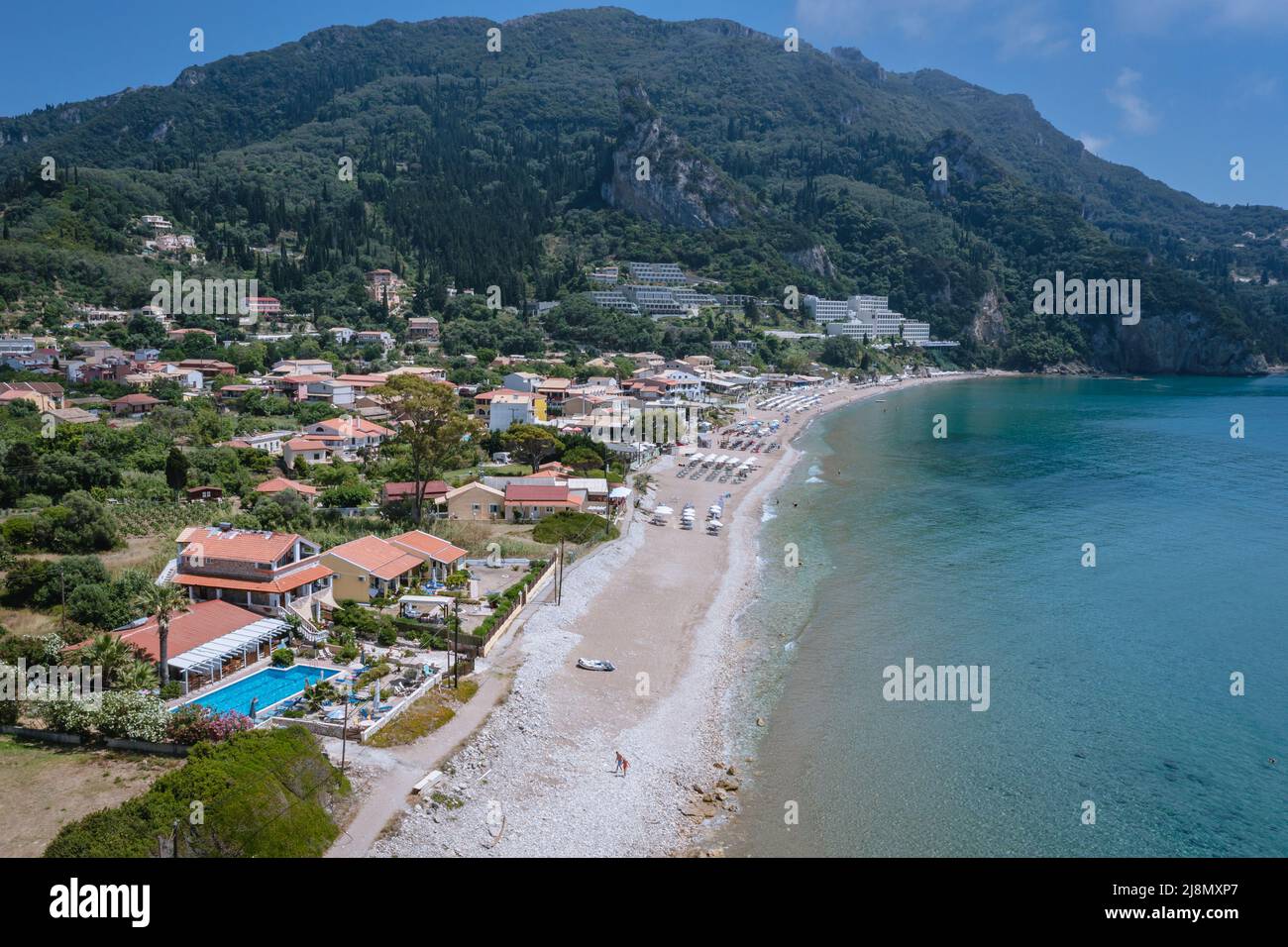 Ai Gordis beach in Agios Gordios town on a Ionian Sea coast on a Greek Island of Corfu Stock ...