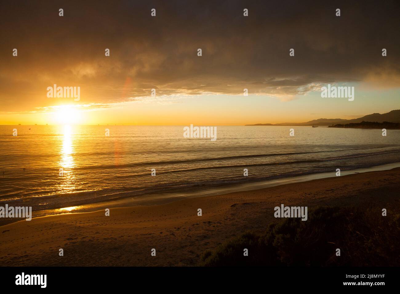 Golden sky sunset pacific hi-res stock photography and images - Alamy