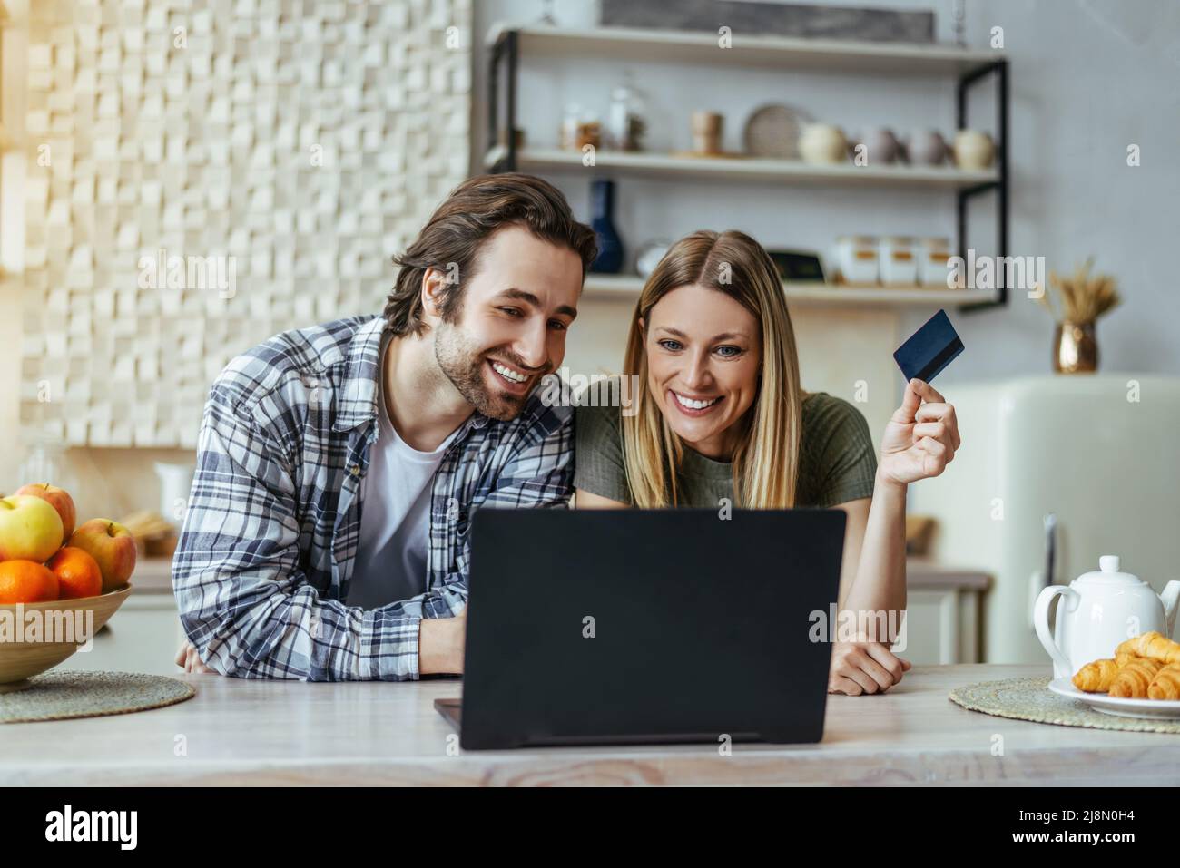 Glad Caucasian Millennial Man With Stubble And Blonde Woman Show Credit