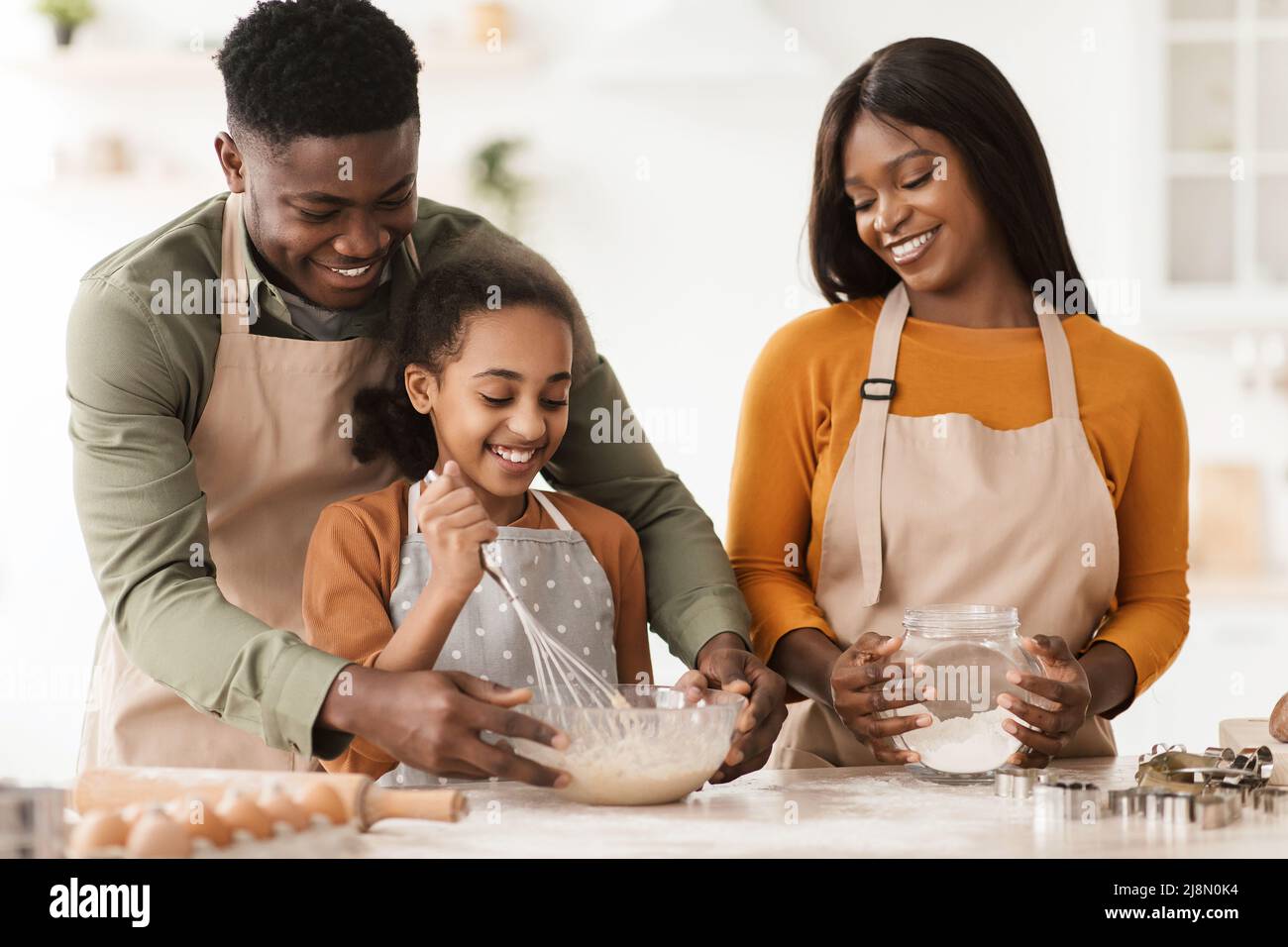 African American Family Making Dough Baking Cake Together In Kitchen ...