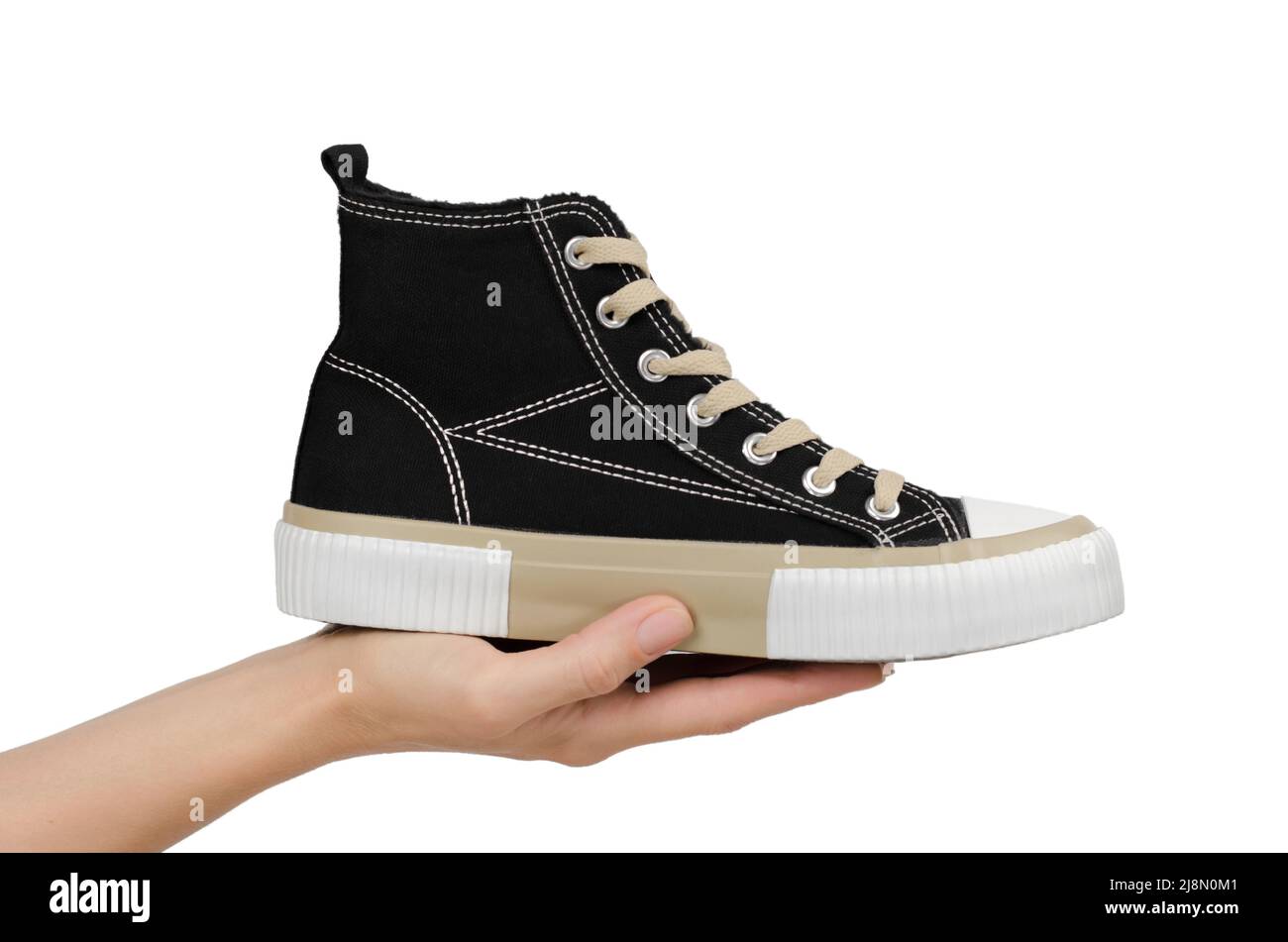 Stylish black sneakers in hi-res stock photography and images - Alamy