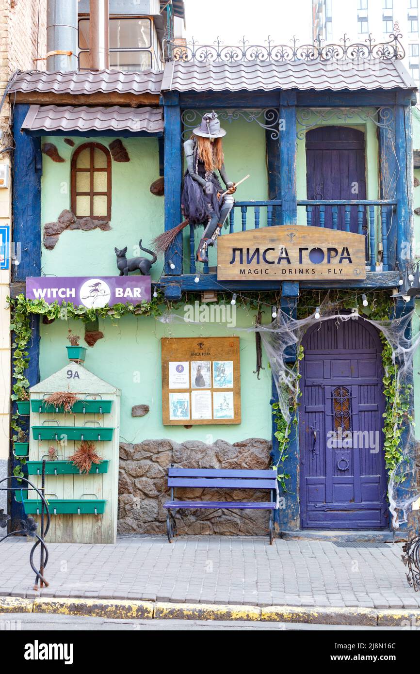Facade of the mystical witch bar on the city street of the old city in ...