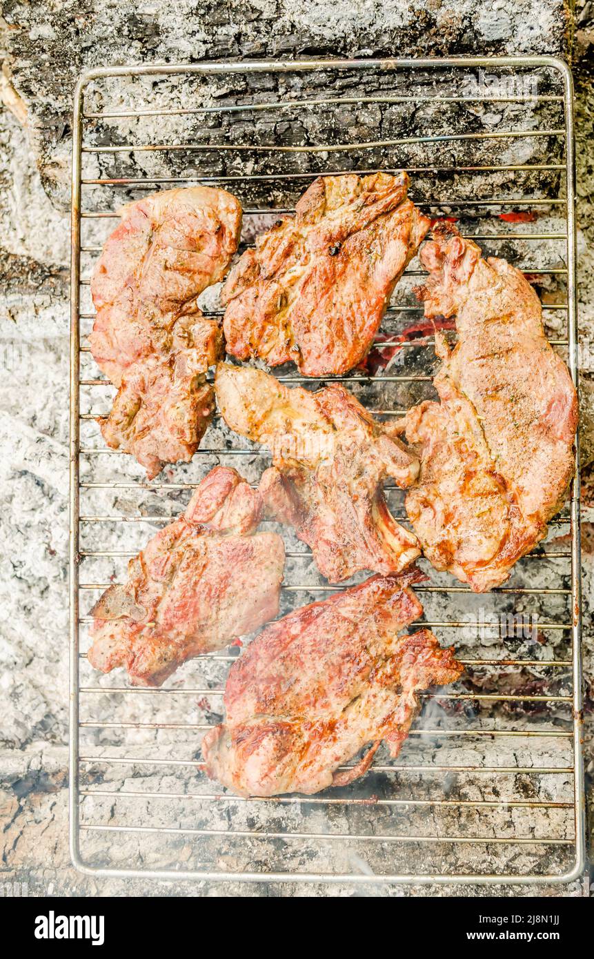 Meat on a metal grill hi-res stock photography and images - Alamy