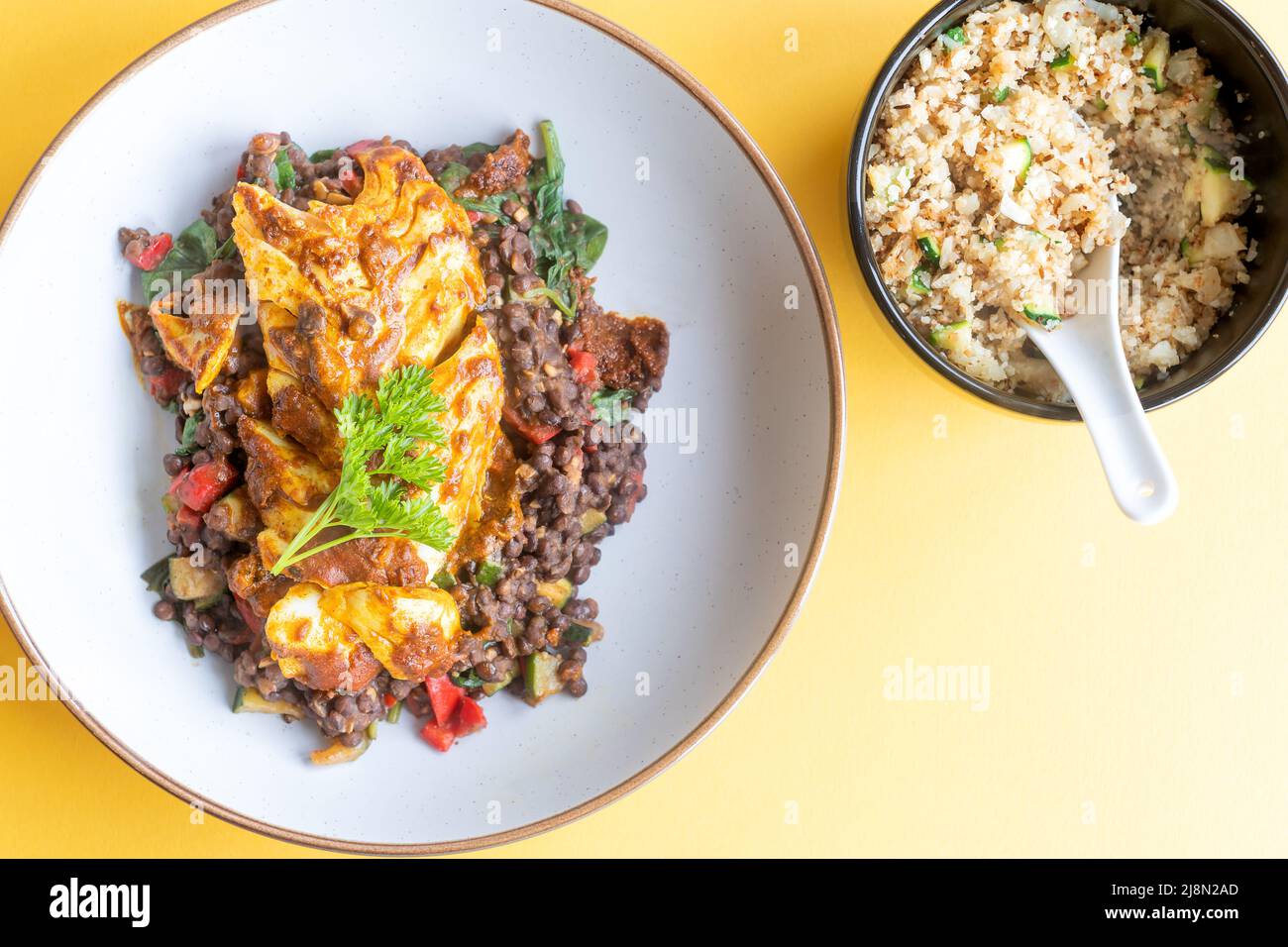 A fresh cod loin, marinated in Tikka curry paste and then served on a ...