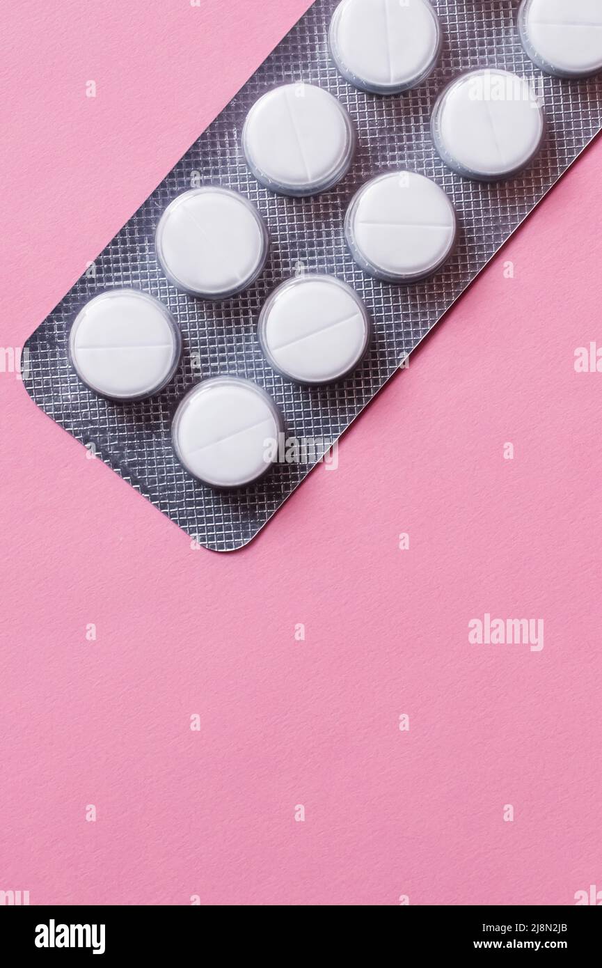 top view of blister pack with round shape pills isolated on pink Stock ...
