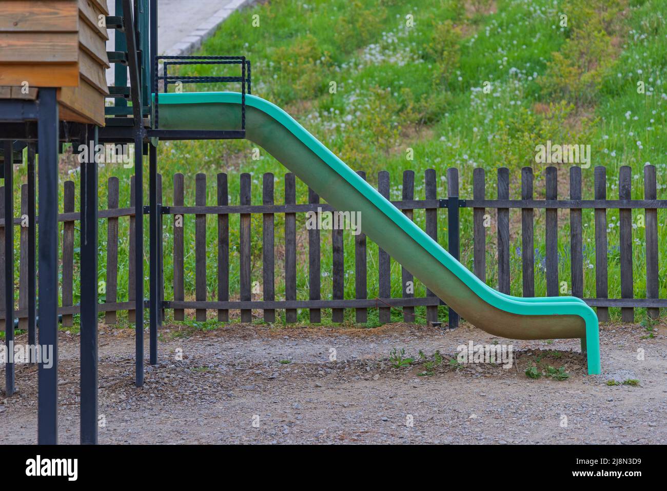 Green Slide Children Playground Fun in Kids Park Stock Photo - Alamy