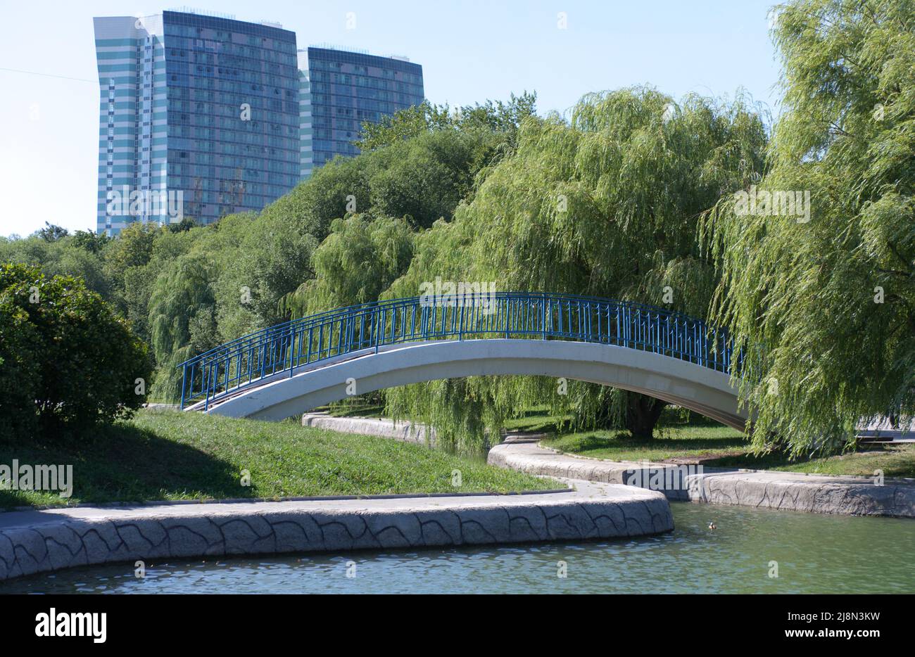 bridge over pond in park at dry sunny summer day Stock Photo - Alamy