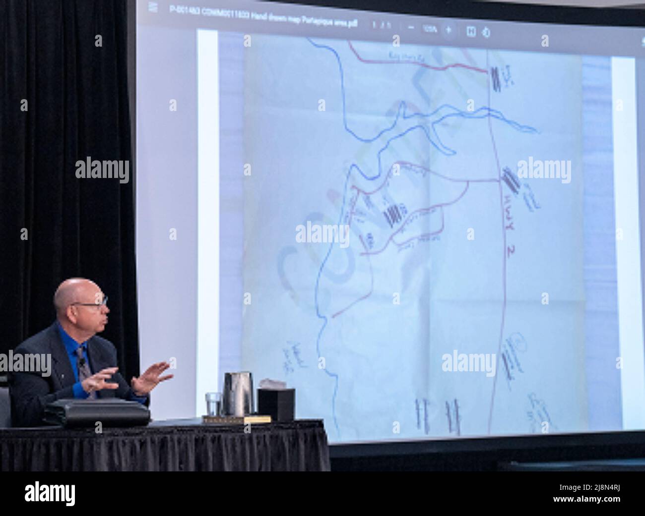 Retired RCMP Staff Sgt. Steve Halliday talks about a hand-drawn map as ...