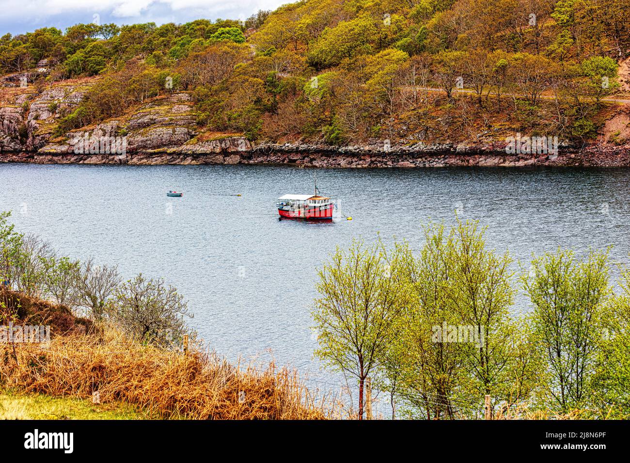 Fishing boat in the picturesque Highland village of Plockton,The Jewel ...