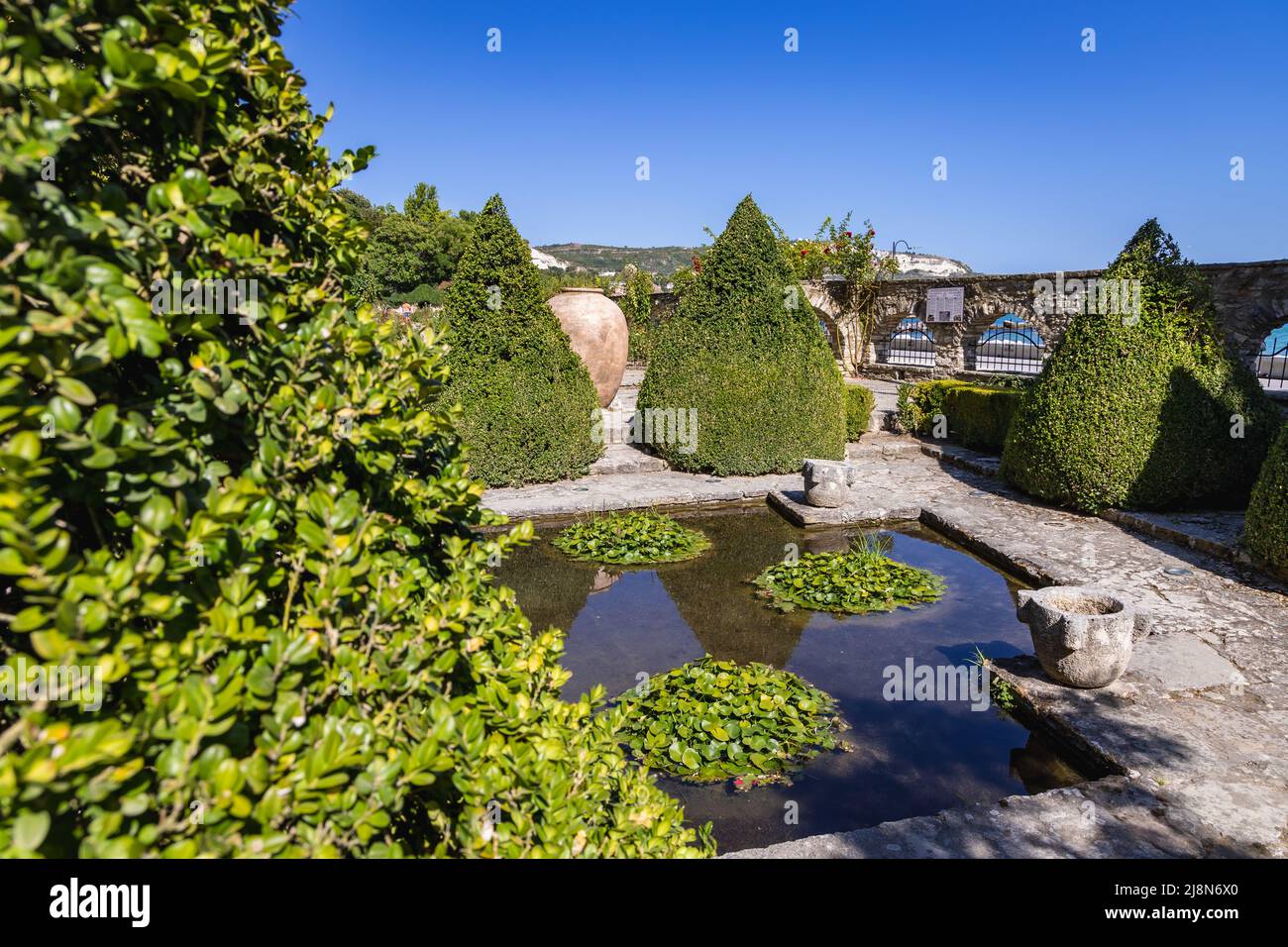 Small pond in English garden of The Palace architectural park and ...
