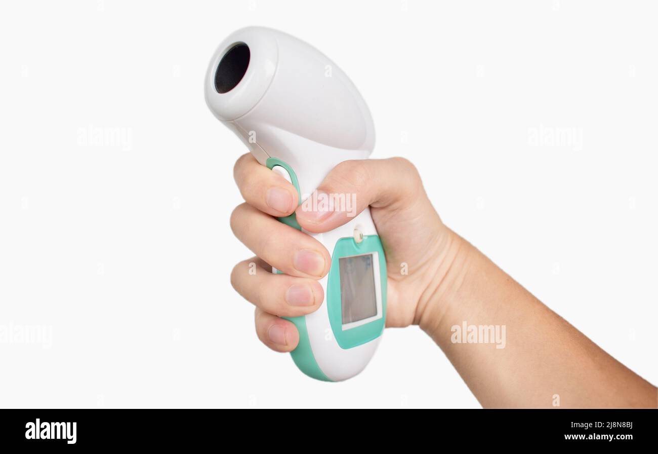 Non-contact infrared forehead digital thermometer. Isolated on white ...