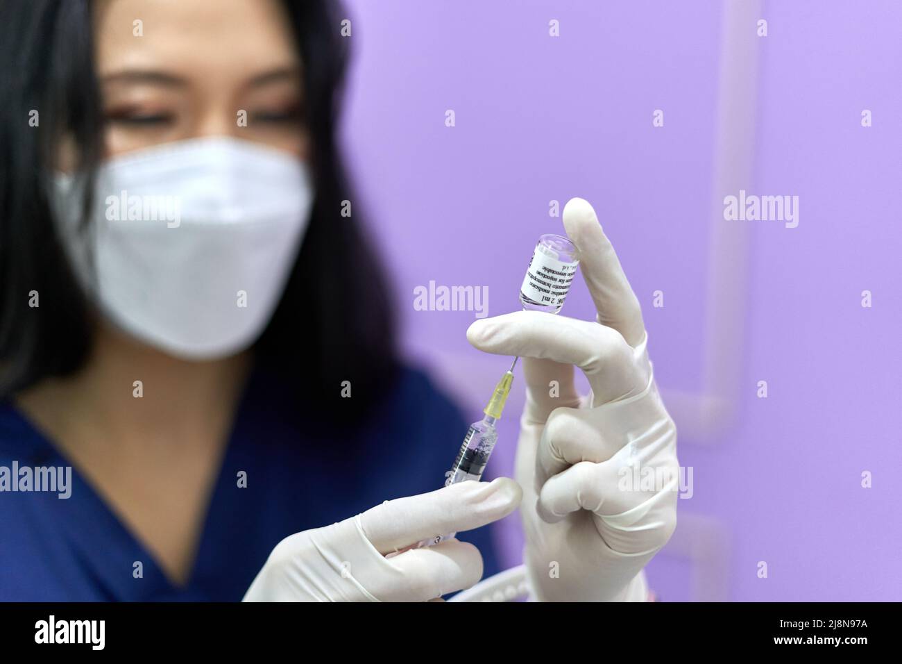 Doctor preparing a injection at a beauty treatment clinic Stock Photo ...