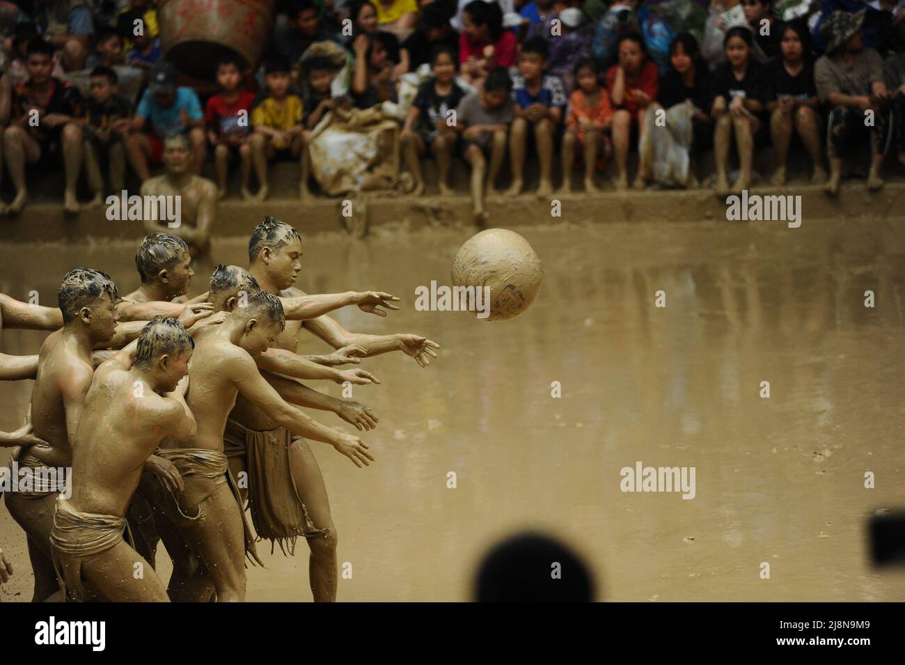 Vietnam mud ball wrestling Stock Photo - Alamy