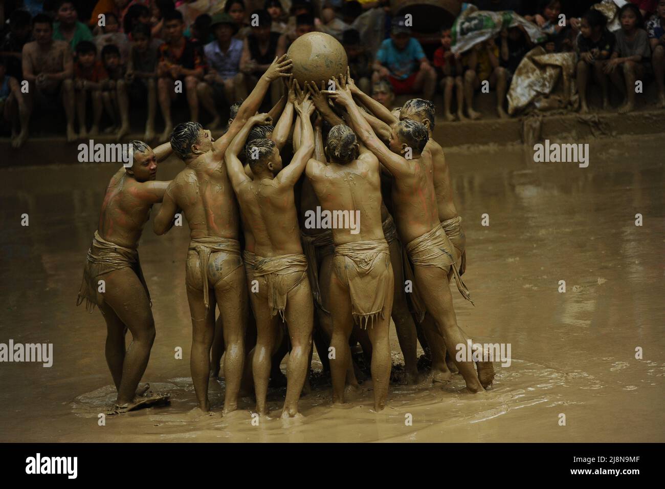 Vietnam mud ball wrestling Stock Photo - Alamy