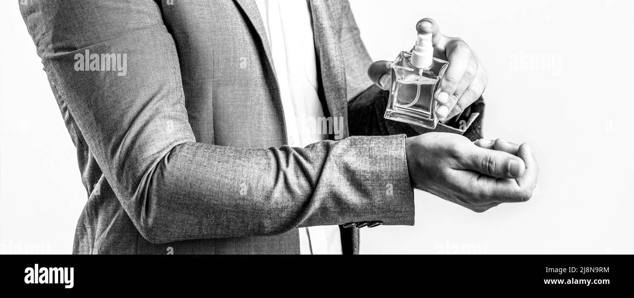 Fragrance smell. Men perfumes. Fashion cologne bottle. Man holding up ...
