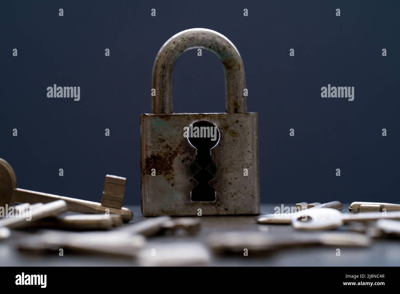 Lock and multiple keys on grey background. Concept of problem solving ...
