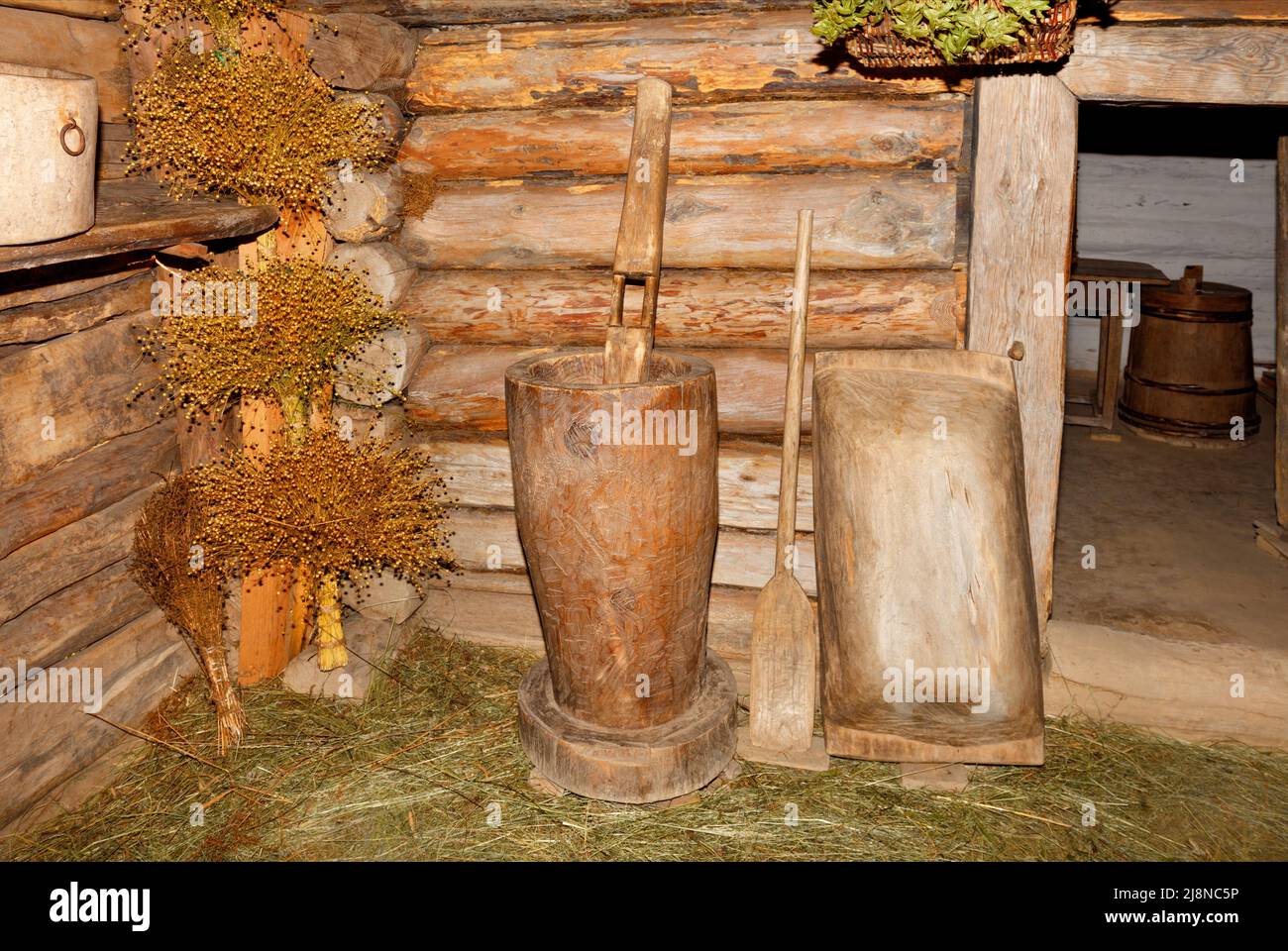 Antique wooden kitchen utensils - a mortar, a shovel for an oven and a ...